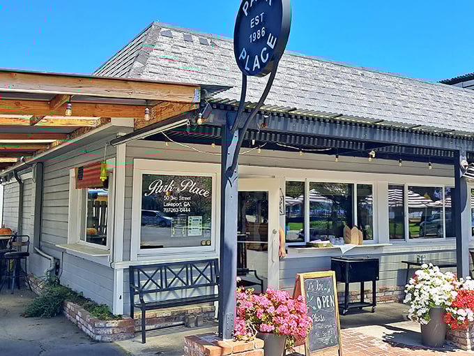 Park Place Restaurant's flower-adorned entrance promises the kind of meal that makes you lean back and sigh with contentment afterward.