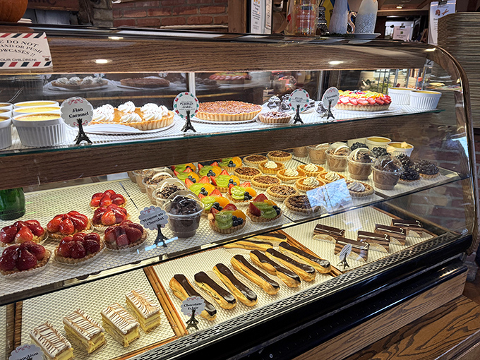 A display case that should come with a warning: "Caution: May cause spontaneous dessert decisions and pastry-induced happiness."