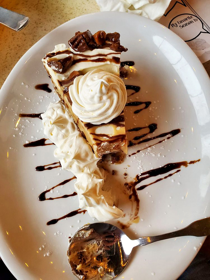 This slice of heaven isn't just dessert&mdash;it's the sweet finale to a seafood symphony, with whipped cream conducting the last delicious notes.