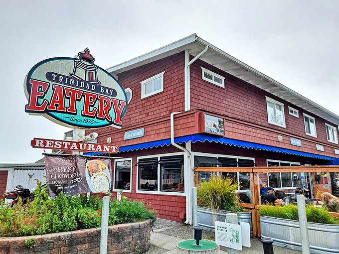 The Trinidad Bay Eatery's weathered red siding and vintage sign promise exactly what coastal dining should be: unpretentious and seafood-focused.