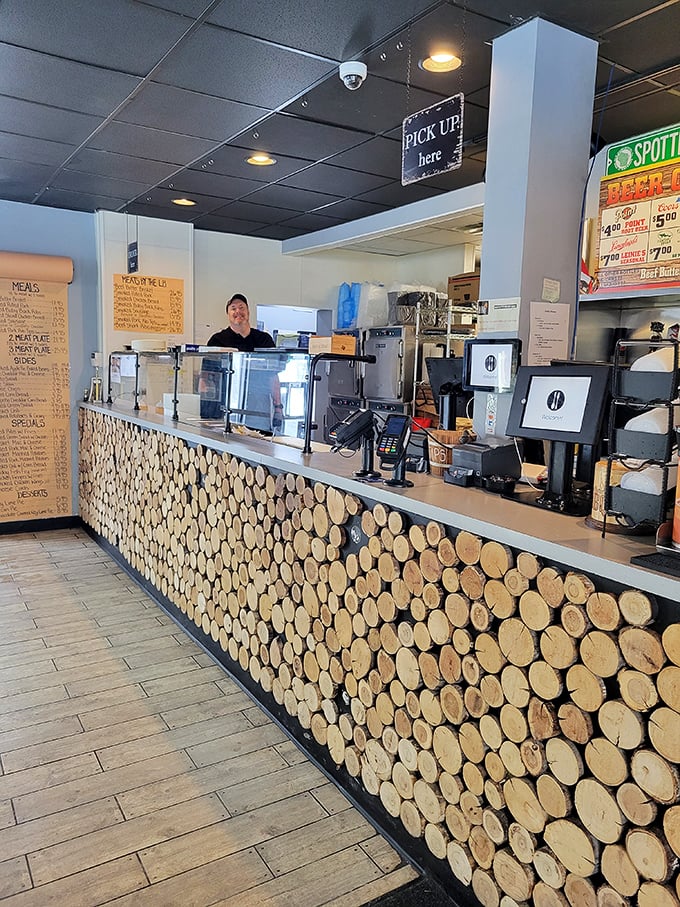 The counter's log facade is a nice touch &ndash; like a visual reminder of the wood that helps create the smoky magic happening behind the scenes.