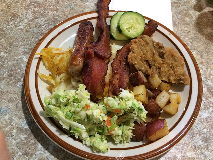 A plate that says "I'm not counting calories today"&mdash;crispy bacon, golden potatoes, and enough comfort food to fuel a small hiking expedition.