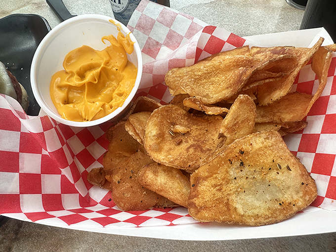 House-made potato chips with cheese dip&mdash;proof that sometimes the simplest combinations are the ones that make you wonder why you'd ever order anything else.