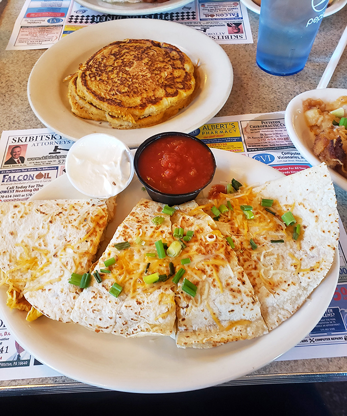 Quesadillas and pancakes sharing a plate like old friends&mdash;proof that breakfast and lunch boundaries were meant to be deliciously blurred.