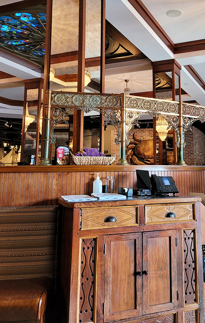 Elegant woodwork and vintage details at the host stand &ndash; first impressions matter, even in a place where you'll soon be elbow-deep in crab.