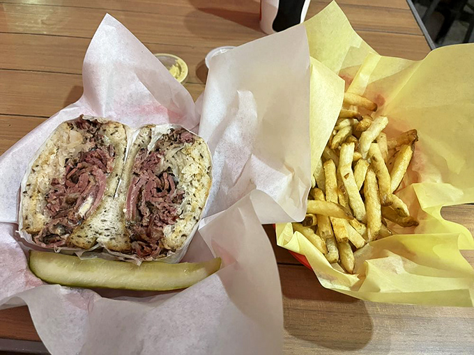 The Reuben: where pastrami meets its soulmates—sauerkraut and rye bread—in a sandwich romance for the ages.