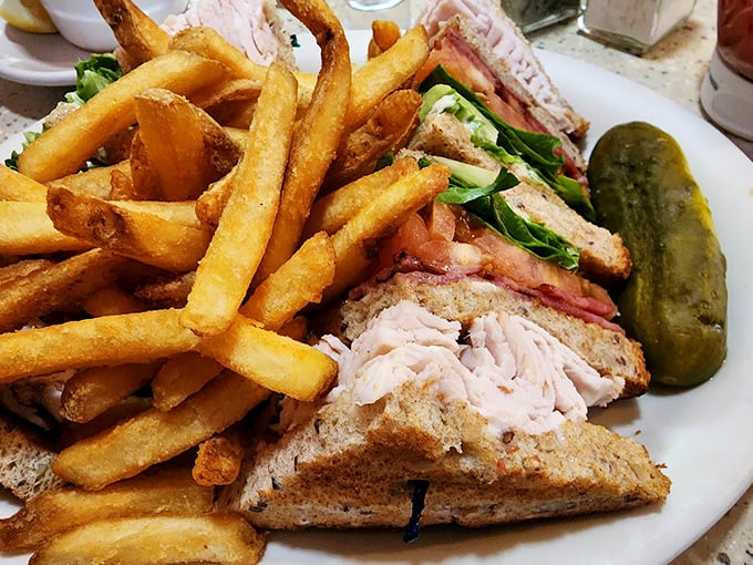 The club sandwich&mdash;architecture you can eat, with layers of turkey, bacon, and vegetables forming a skyscraper of satisfaction.