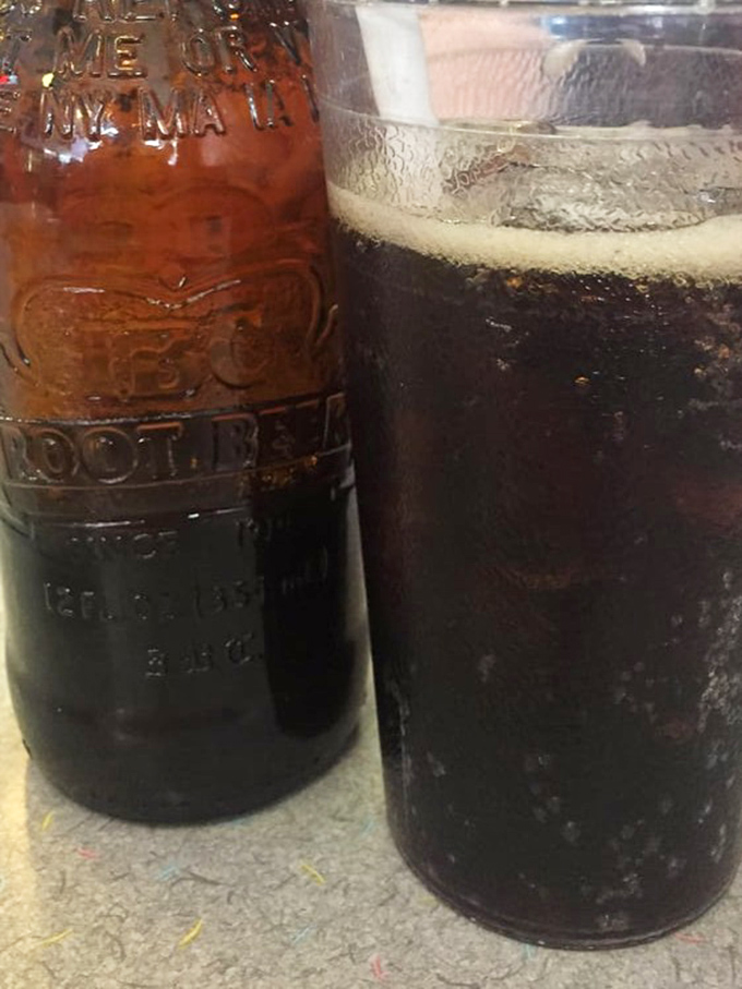 Root beer in those classic brown bottles—delivering nostalgia in liquid form with every fizzy, caramel-tinged sip.