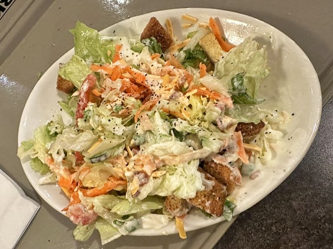 Fresh salad loaded with colorful toppings &ndash; because even carnivores need their vegetables to feel virtuous.