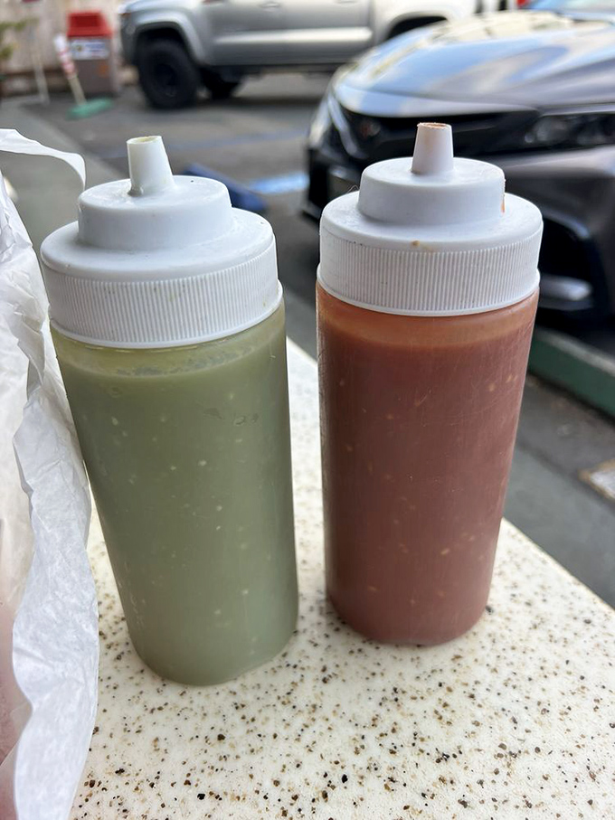 Squeeze bottles of liquid gold. The green and red salsas are the perfect accessories to any meal here &ndash; like jewelry for your taste buds.