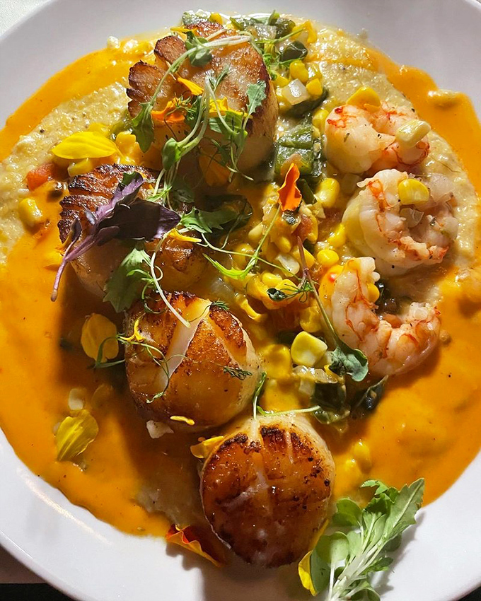 A symphony of scallops, corn, and vibrant sauce that makes you wonder if the chef has somehow figured out how to plate sunshine.