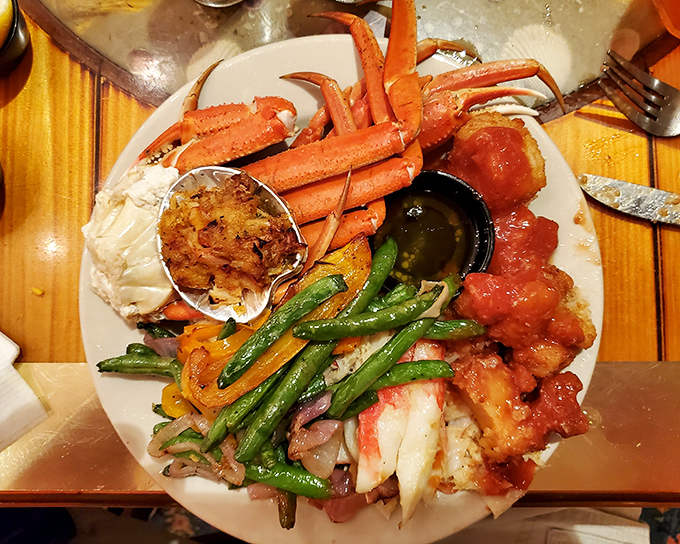A plate that requires strategy: Do you start with the crab legs, the vegetables, or create the perfect bite combining both? Decisions, decisions.