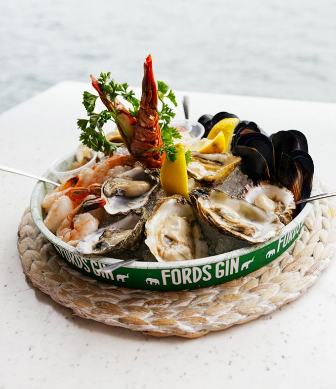 This seafood platter isn't just a meal; it's a maritime celebration on ice. The lobster claw stands tall like it's directing this delicious orchestra of ocean treasures.