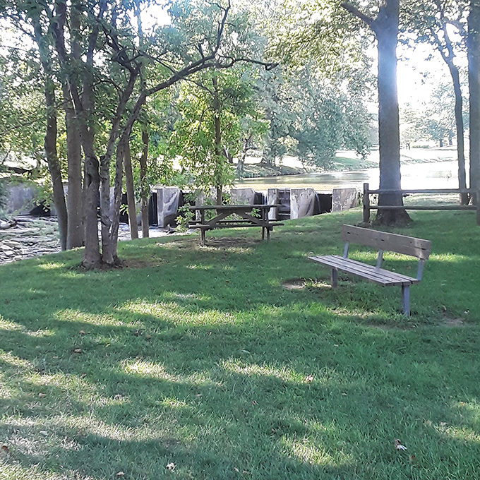 Picnic tables and benches invite visitors to linger, because some views deserve more than just a passing glance or hasty smartphone photo.