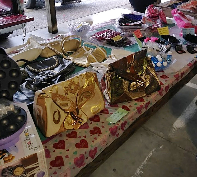 Vintage handbags with stories to tell, displayed on a table that's seen more fashion trends come and go than a runway model's career.