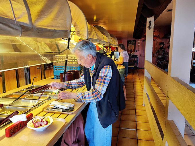 The salad bar wagon isn't just functional&mdash;it's a charming reminder that good food doesn't need to arrive on a wooden board or slate tile.