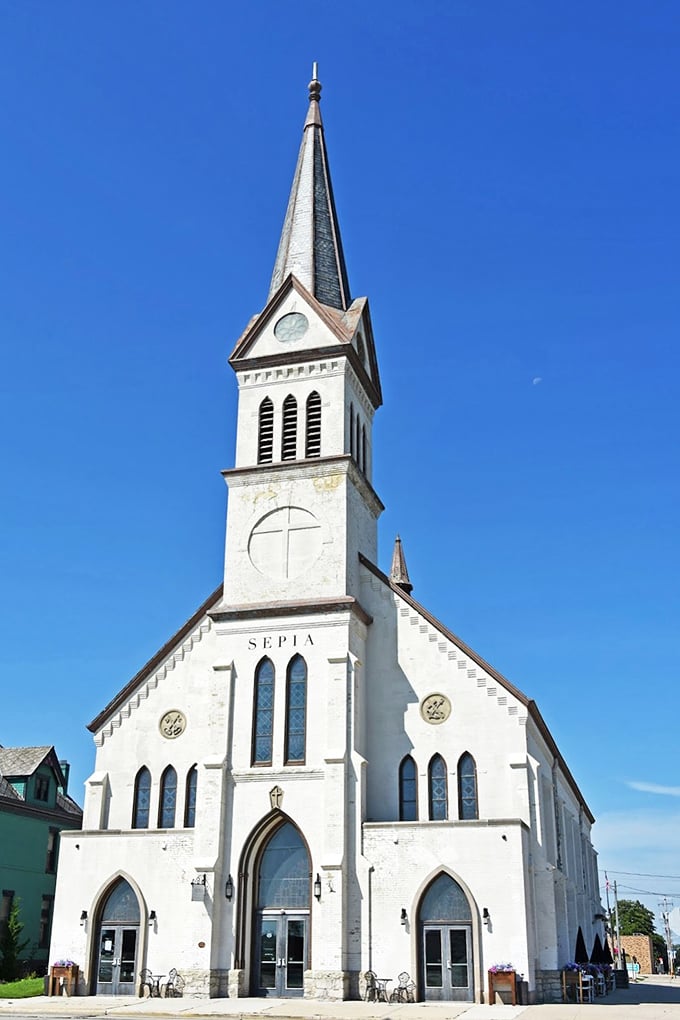 Sepia Chapel's pristine white exterior and soaring steeple create a picture-perfect backdrop for weddings or simply appreciating historical craftsmanship.
