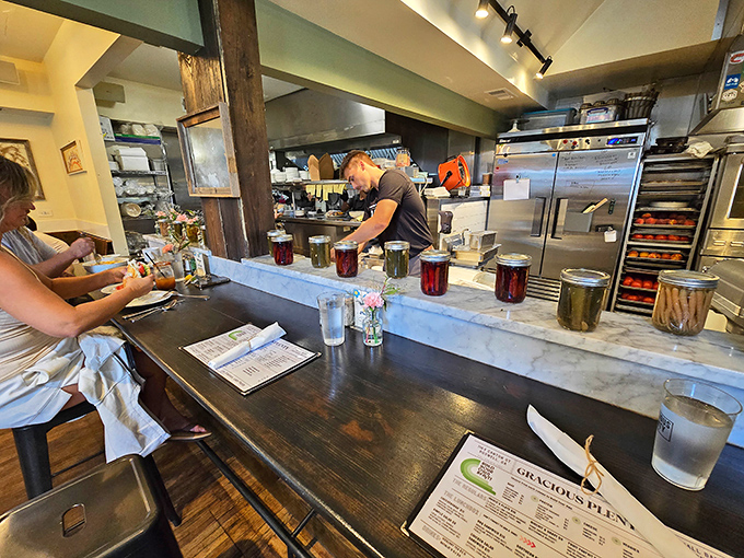 The service counter where breakfast dreams come true—watch as skilled hands transform simple ingredients into morning masterpieces.
