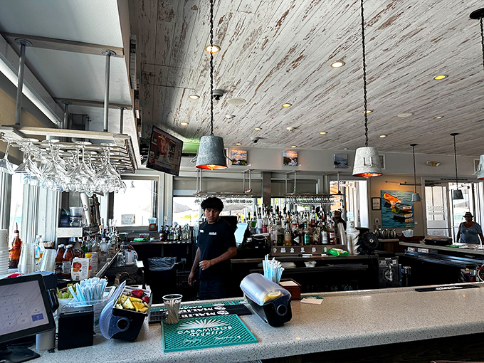 Where liquid happiness is dispensed with a smile. The bar's weathered ceiling has heard thousands of "best meal ever" declarations.