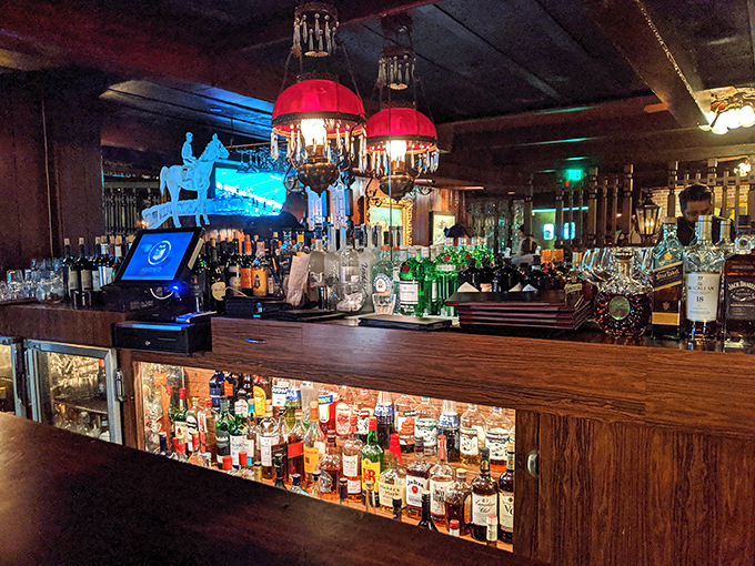 The brick wall and gold-framed artwork create the perfect backdrop for decisions of great importance &ndash; like whether to order dessert.