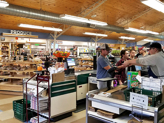 The checkout area buzzes with friendly conversation—that magical place where transactions become connections and shopping feels personal again.