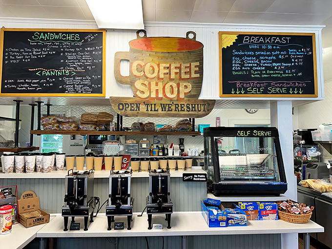The coffee station sign reads "Open 'til we're shut" – the kind of honest marketing Madison Avenue could learn something from.