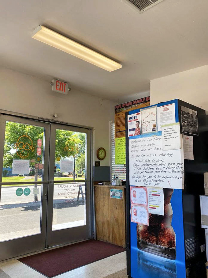 The entrance welcomes you with handwritten notes and community announcements &ndash; the hallmark of a true local establishment that values connection.