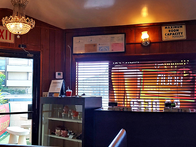 The entrance area welcomes you with promises of meaty treasures beyond. That chandelier adds unexpected elegance to BBQ proceedings.