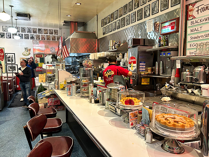 That counter with its row of classic stools isn't just functional&mdash;it's the stage where milkshake magic happens in full view of an appreciative audience.