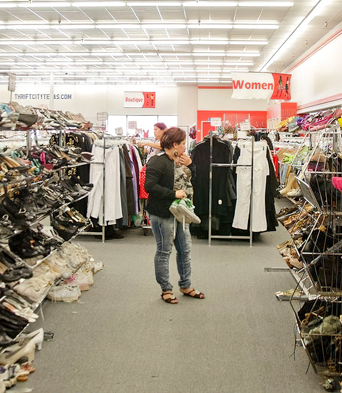 The thrill of the hunt in action. Every serious thrifter knows that perfect find might be hiding just around the next rack. 