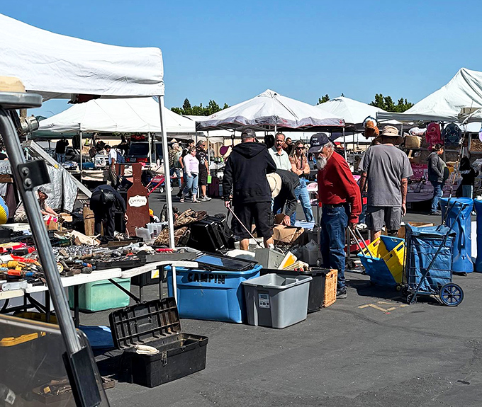 Weekend warriors on the hunt. The thrill of the find brings shoppers from all walks of life to this asphalt treasure map. 
