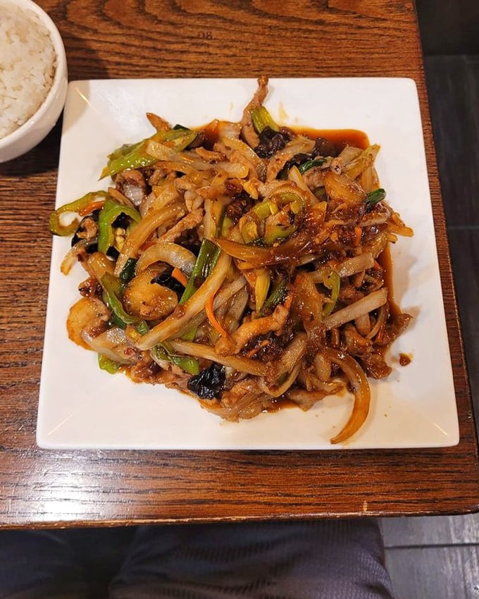 Shredded pork noodles that'll make you forget every sad desk lunch you've ever eaten.