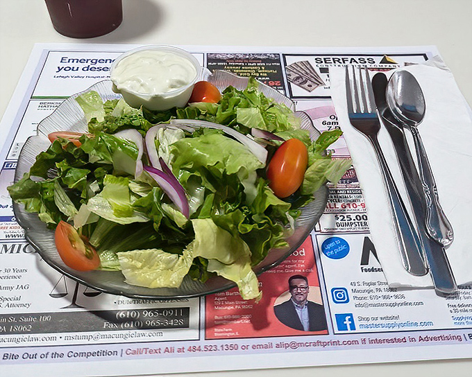 A side salad that actually tries. Fresh, crisp, and colorful—not just the obligatory green stuff restaurants throw on plates to make you feel less guilty.