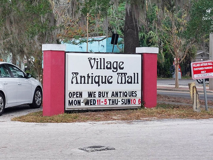 The sign says they buy antiques too&mdash;creating a circular economy of nostalgia that keeps Mount Dora's vintage heart beating.