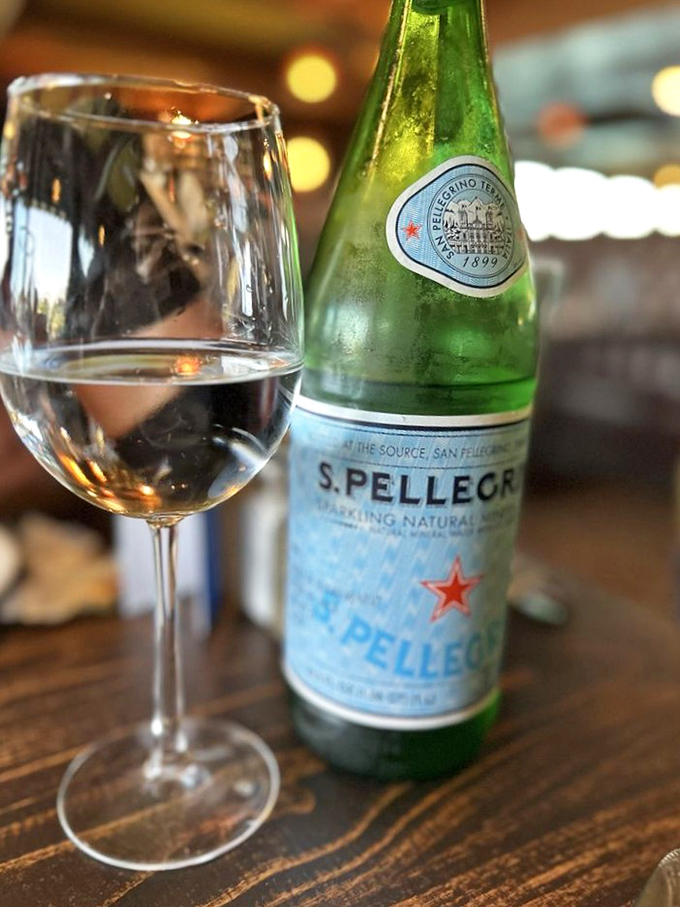 Even the water service feels special &ndash; San Pellegrino alongside stemware that makes you sit up straighter and pretend you know about wine regions.