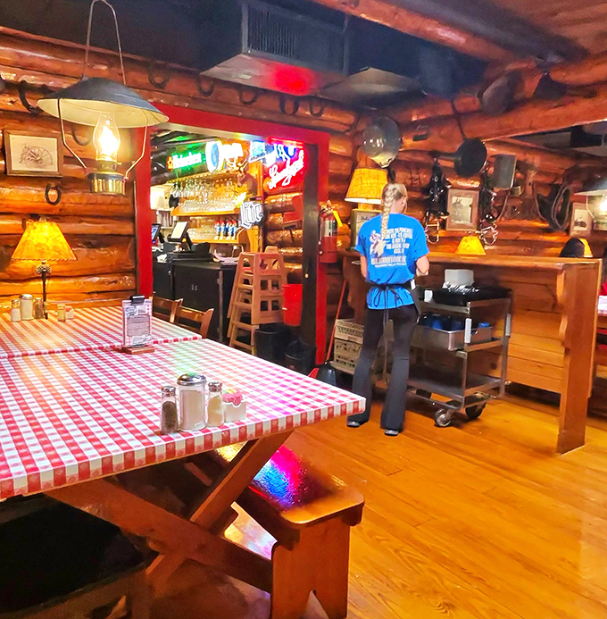 The rustic bar area where Old Fashioneds meet old-fashioned hospitality. Wisconsin's favorite cocktail tastes better surrounded by authentic northwoods charm.