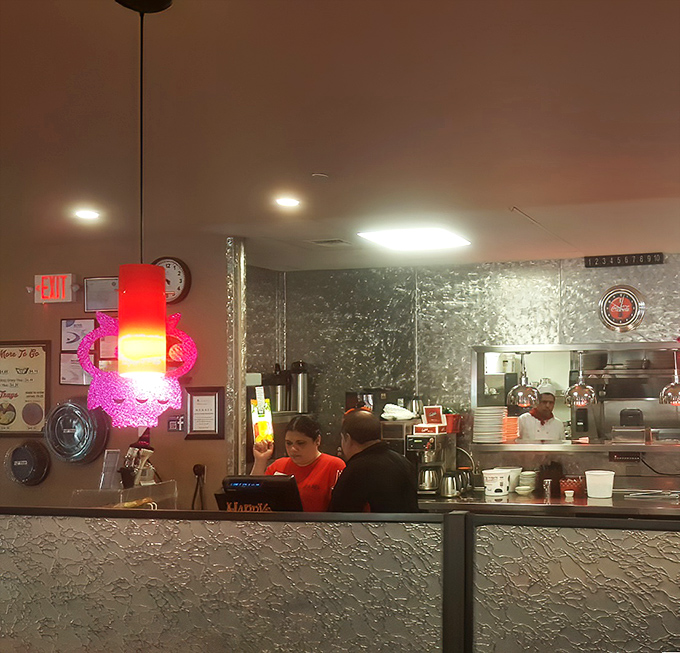 Behind the scenes, the kitchen staff orchestrates the symphony of sizzles and aromas that will soon become someone's favorite meal memory.