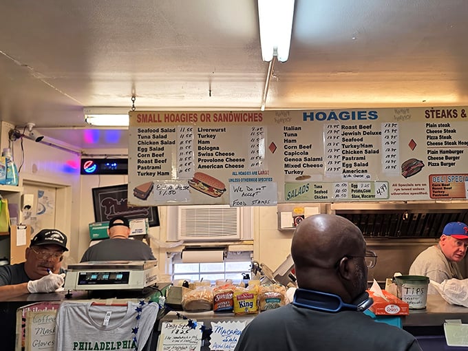 Behind the counter, sandwich artisans work their magic. In Philadelphia, these are the hands that feed the city's soul.