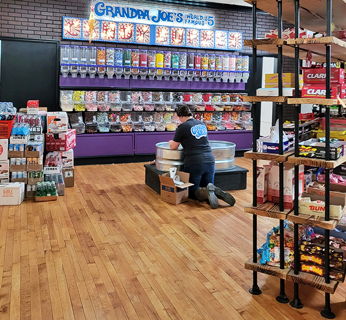 Restocking the candy wall&mdash;a job that requires the precision of a surgeon and the willpower of a saint.