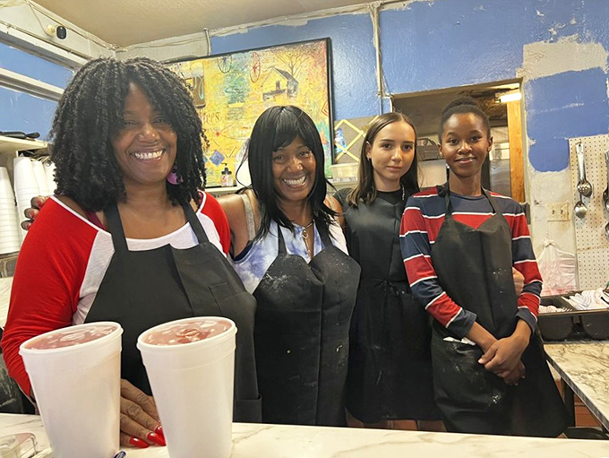 The heart and soul behind the magic. When a team looks this happy in the kitchen, you know the food is made with genuine love.