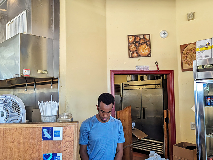 Behind every great restaurant is a dedicated team. This quiet moment in the kitchen is where the magic begins.