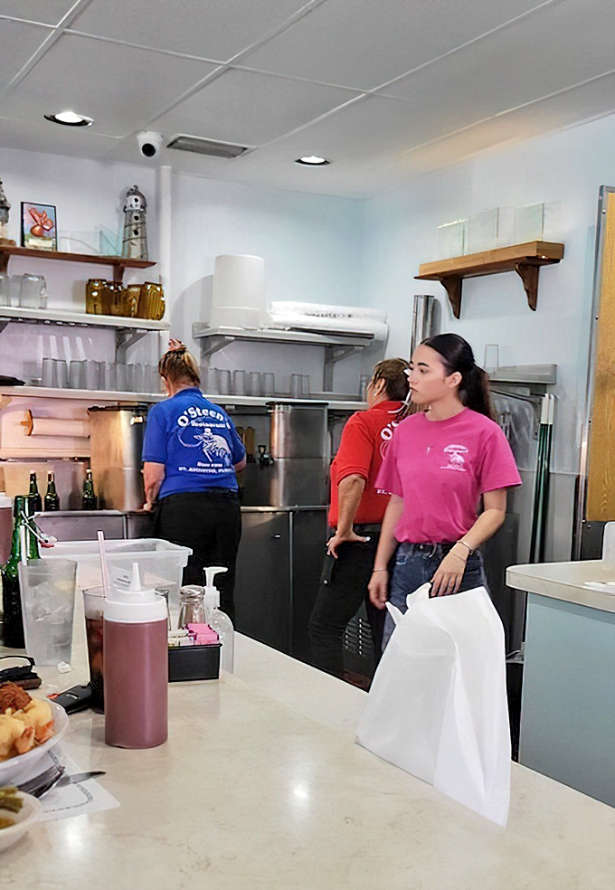 The hardworking crew behind the magic, turning seafood into memories one order at a time.