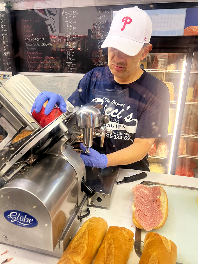Behind every great hoagie is a craftsman with precision tools, slicing meats paper-thin with the focus of a diamond cutter.
