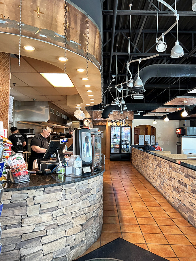 Where pizza dreams come true. That counter has witnessed more moments of food joy than most therapists' couches.