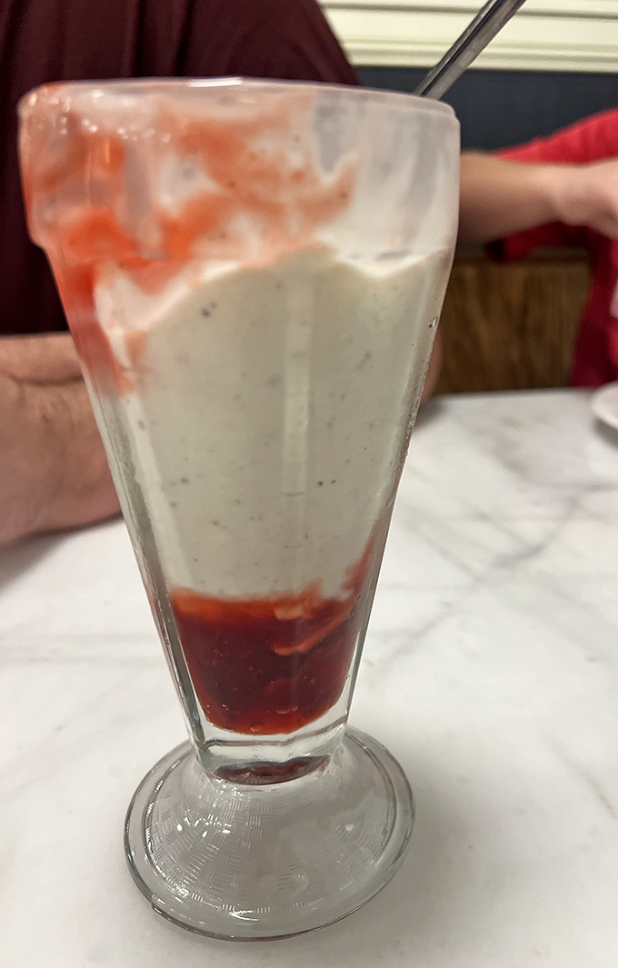 This strawberry creation isn't just a drink&mdash;it's a three-act play in a glass, with the final act being you wondering if it's appropriate to lick the sides.