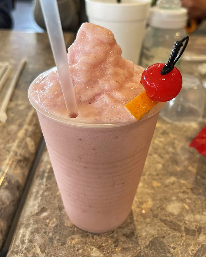 Not just a drink, but a vacation in a cup. This strawberry concoction comes with its own tropical fruit garnish parade.
