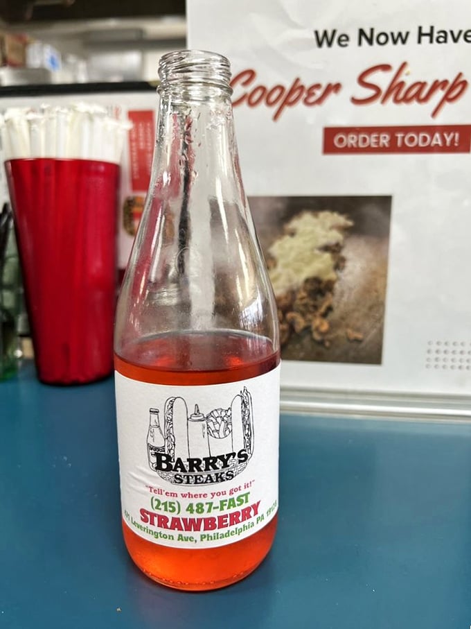 Strawberry soda that's unapologetically pink&mdash;because sometimes your cheesesteak deserves a sweet, fruity sidekick with retro charm.