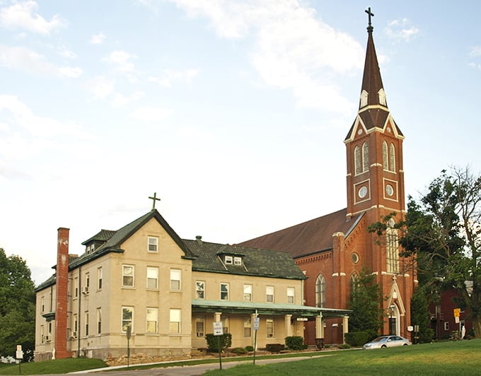 Saints Peter & Paul Catholic Church reaches skyward with its impressive spire, a spiritual landmark that's been comforting souls since long before smartphones existed.