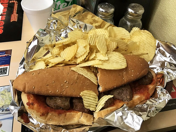 The meatball sub&mdash;where Italian-American dreams are stuffed between bread and served with a side of nostalgia and potato chips.