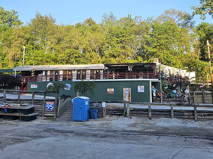 This rustic riverside establishment promises the authentic local experience, where stories flow as freely as whatever's on tap.